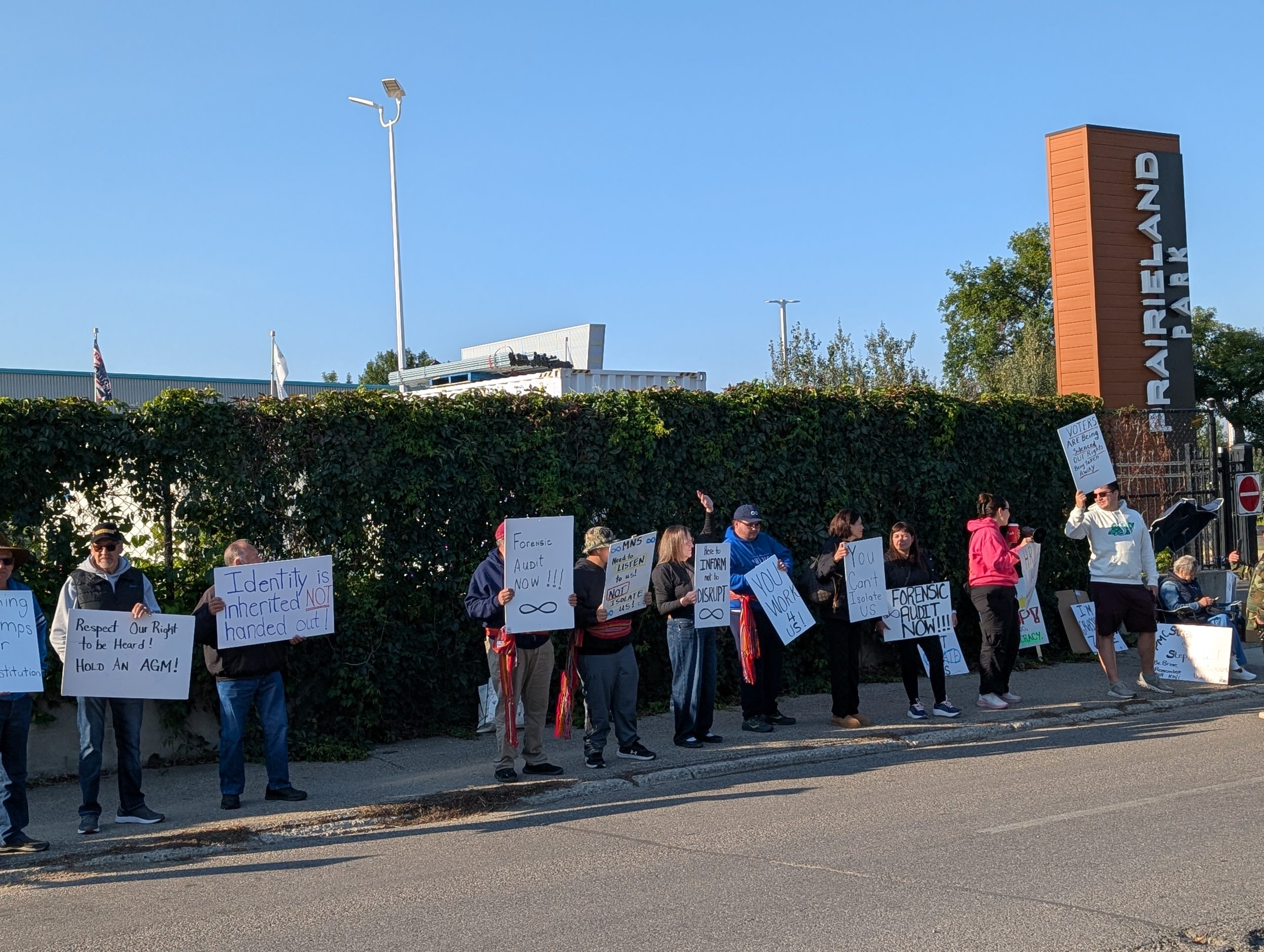 Demonstrators gather outside Metis Nation Legislative Assembly in ...